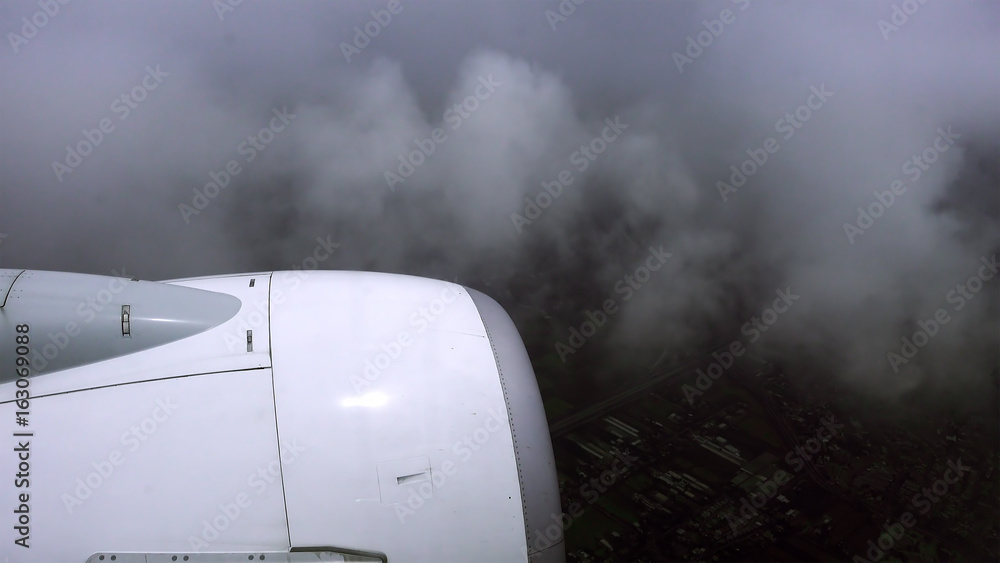 Airliner is flying in a bad weather conditions. Non-flying weather ...