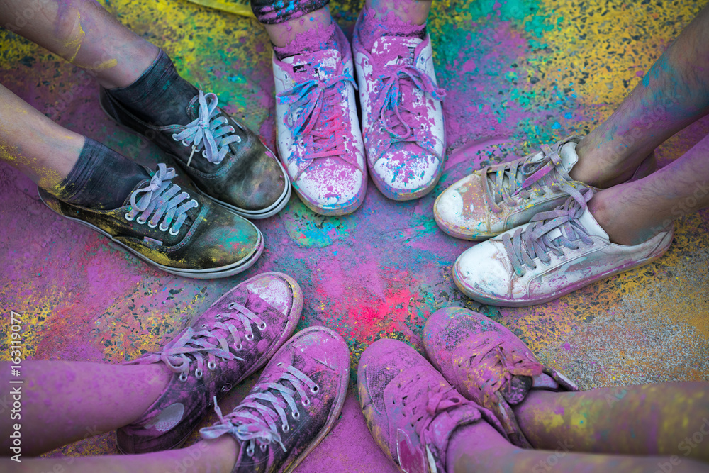 The colorful shoes and legs of teenagers at color run event Stock Photo ...