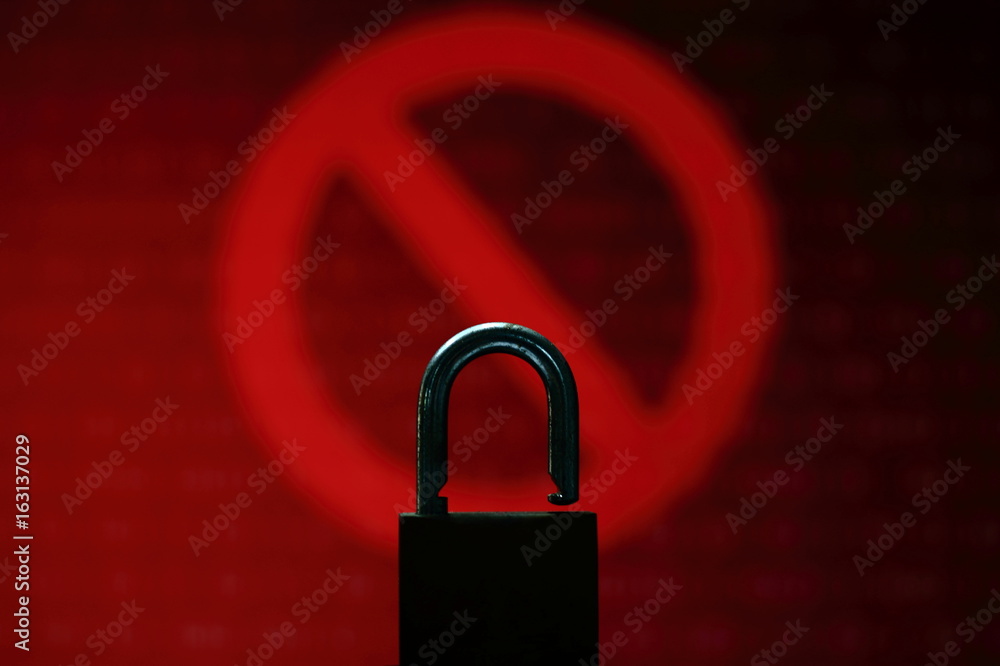 Visus or hacked computer screen. Red binary computer code ransom screen background with stop ...