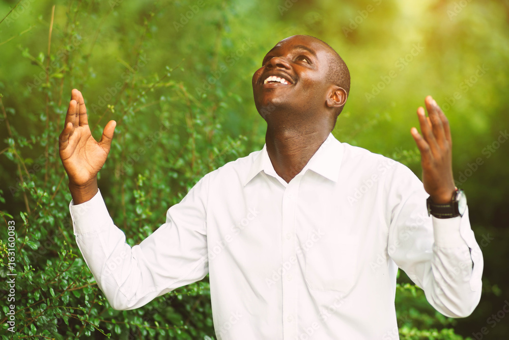 Smile african man praying for thank god. Stock Photo | Adobe Stock