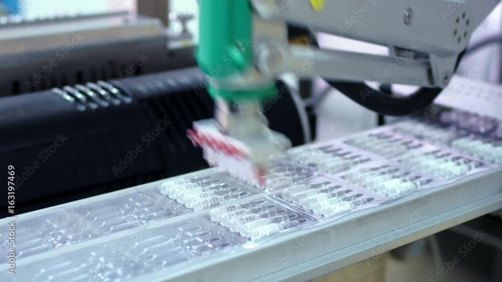 Pharmaceutical packaging line at pharmaceutical plant. Pharmaceutical ...