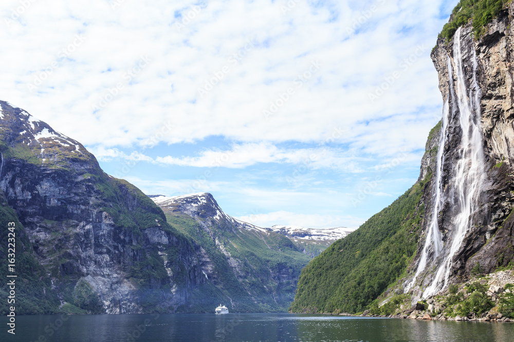 Seven Sisters Waterfall in Geiranger Fjord, Norway. It consists of ...