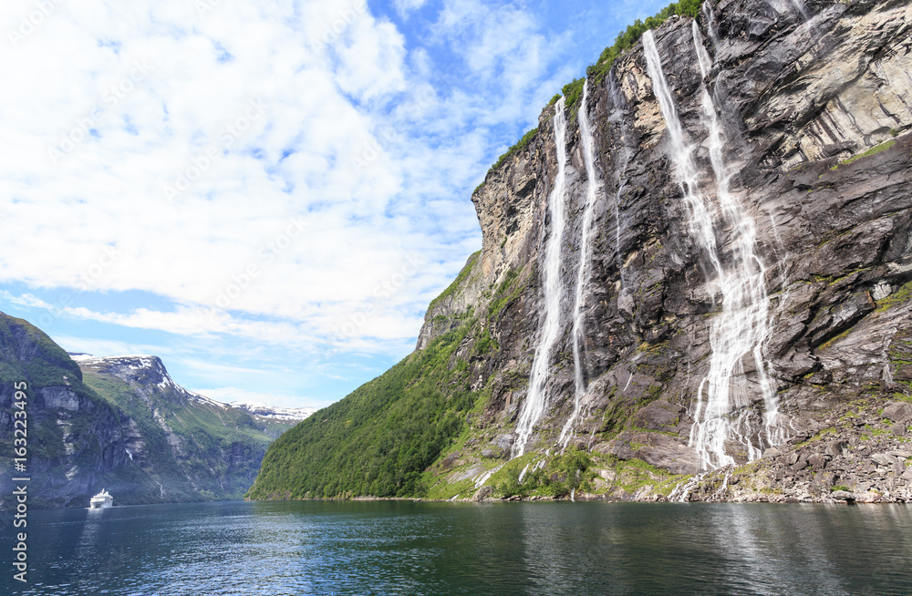 Seven Sisters Waterfall in Geiranger Fjord, Norway. It consists of ...