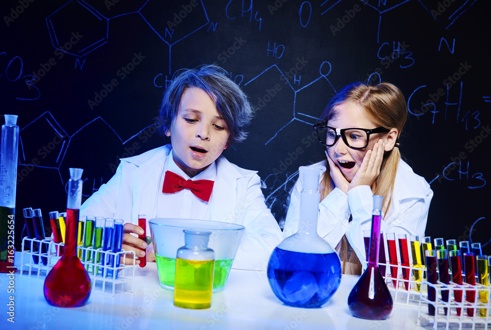 Shocked kids in the chemical laboratory Stock Photo | Adobe Stock