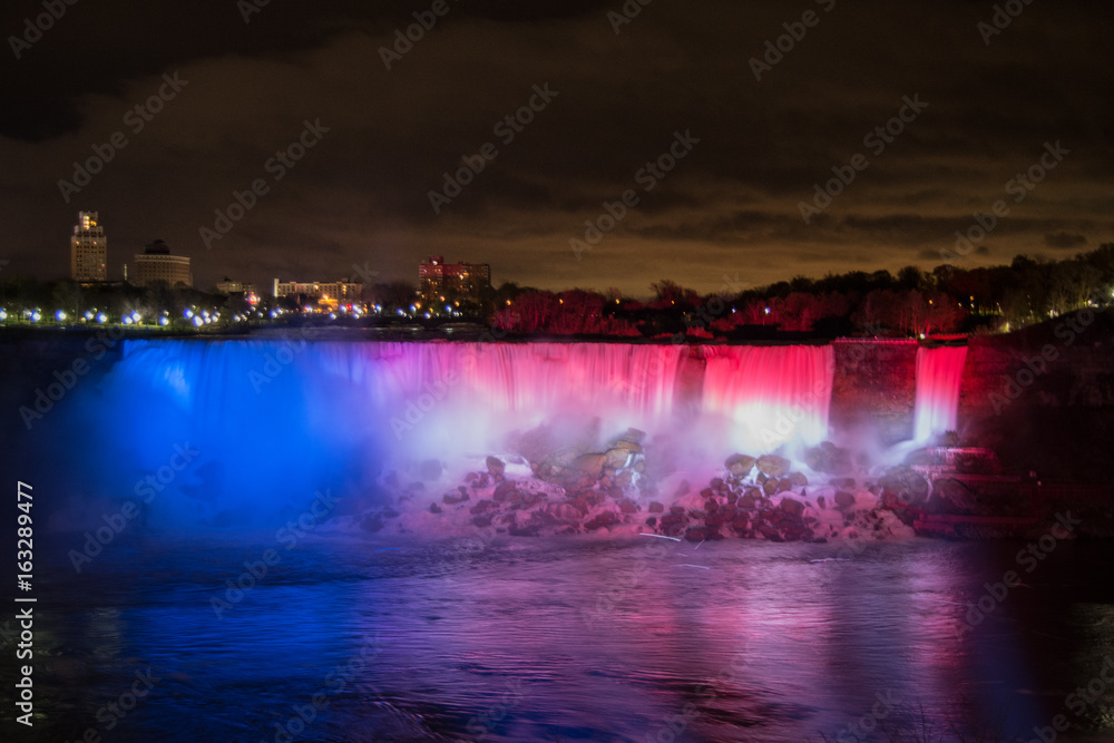 Niagara Falls at night lit red, white and blue Stock Photo | Adobe Stock