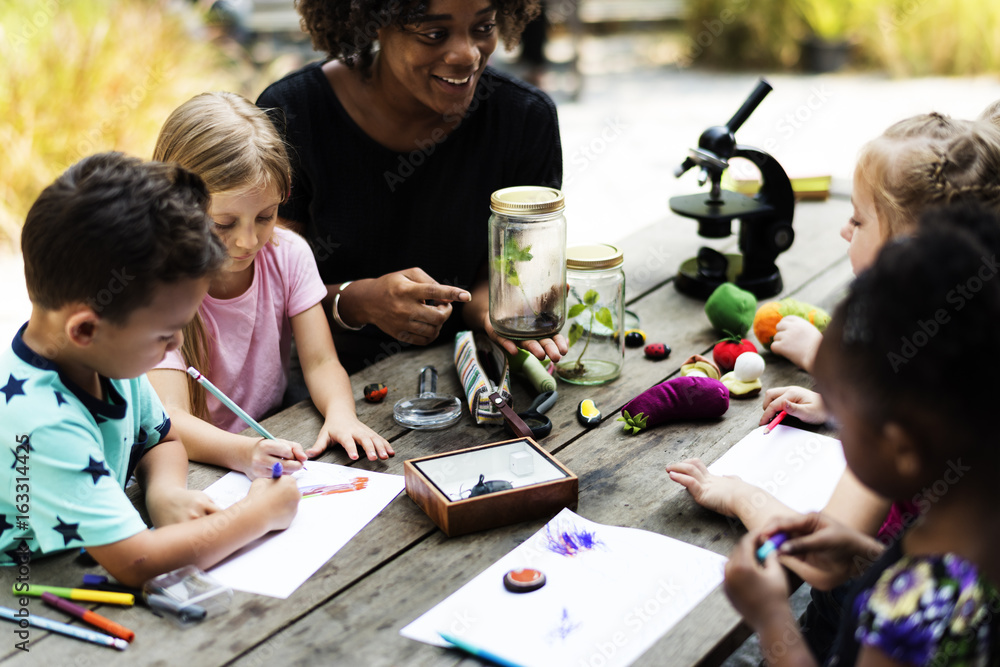 Group of kids classmates learning biology drawing class Stock Photo ...