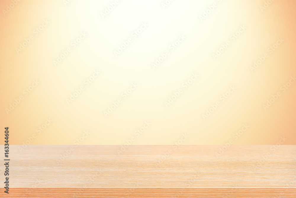 Wood table top on gradient beige background Stock Photo | Adobe Stock
