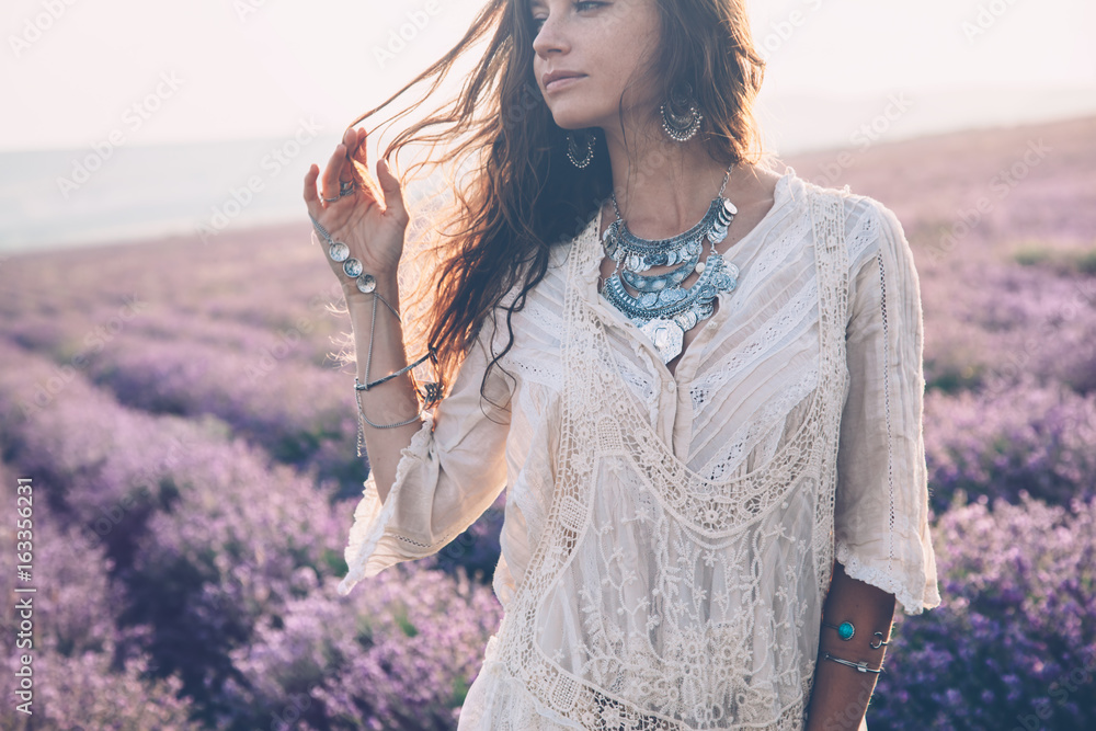 Boho styled model in lavender field Stock Photo | Adobe Stock