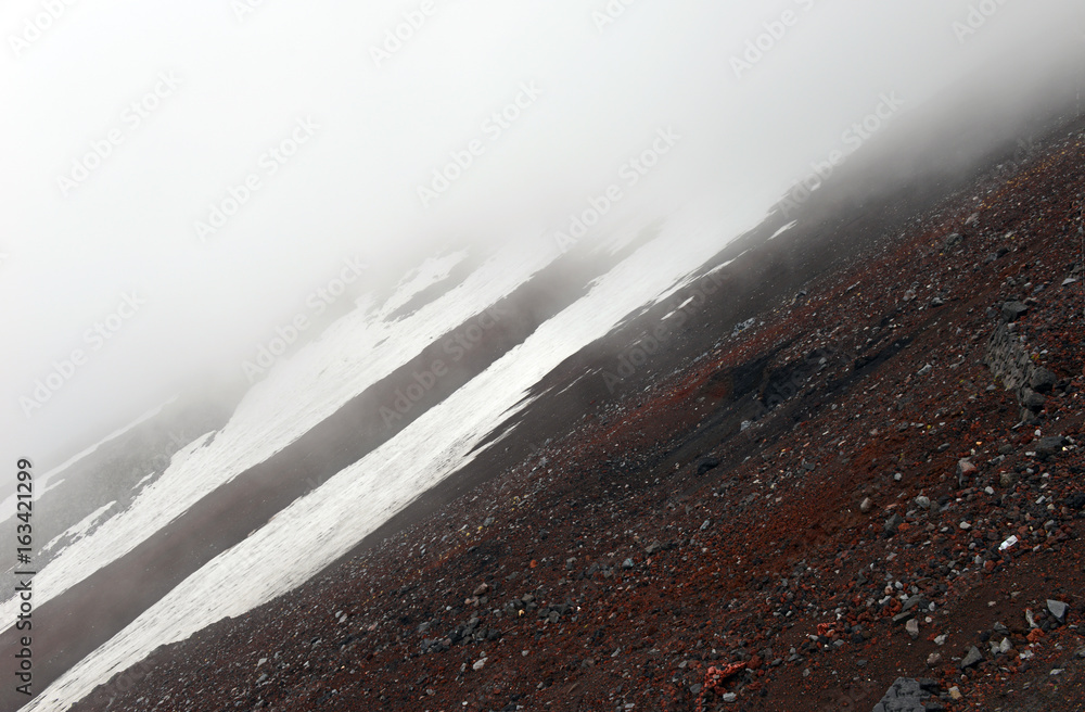 Steep Terrain on climbing route during storm on Mount Fuji, a ...