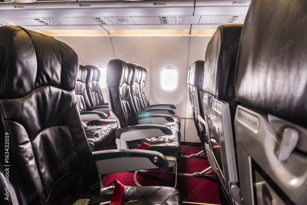 Economy Class Seating Stock Photo | Adobe Stock