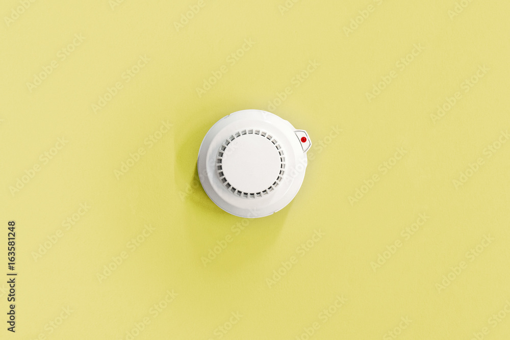 Smoke fire detected Smoke detector on yellow ceiling Stock Photo ...
