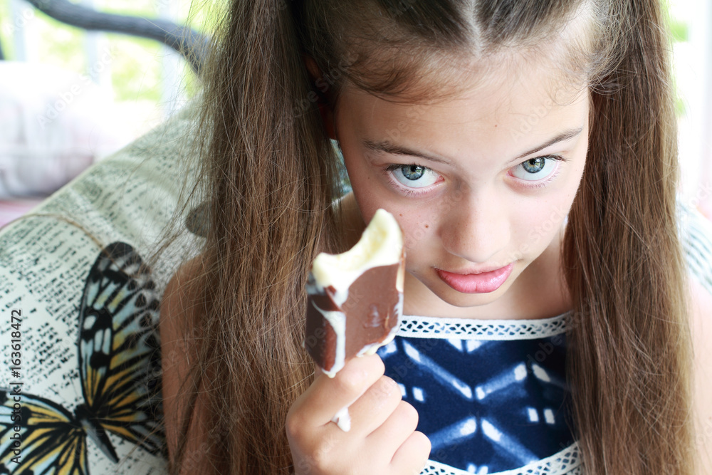 Girl with Melting Ice Cream Stock Photo | Adobe Stock