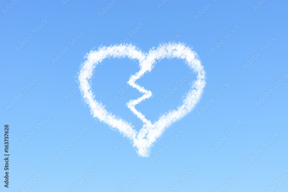 Valentine concept broken heart shaped cloud and arrow with clear blue ...