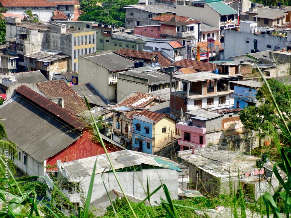Poverty in rural India: jumbled colourful architecture / construction ...