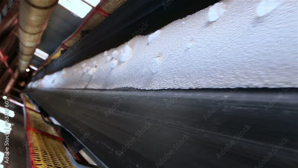 Band conveyer. Conveyor belt. Transportation of granulated raw ...