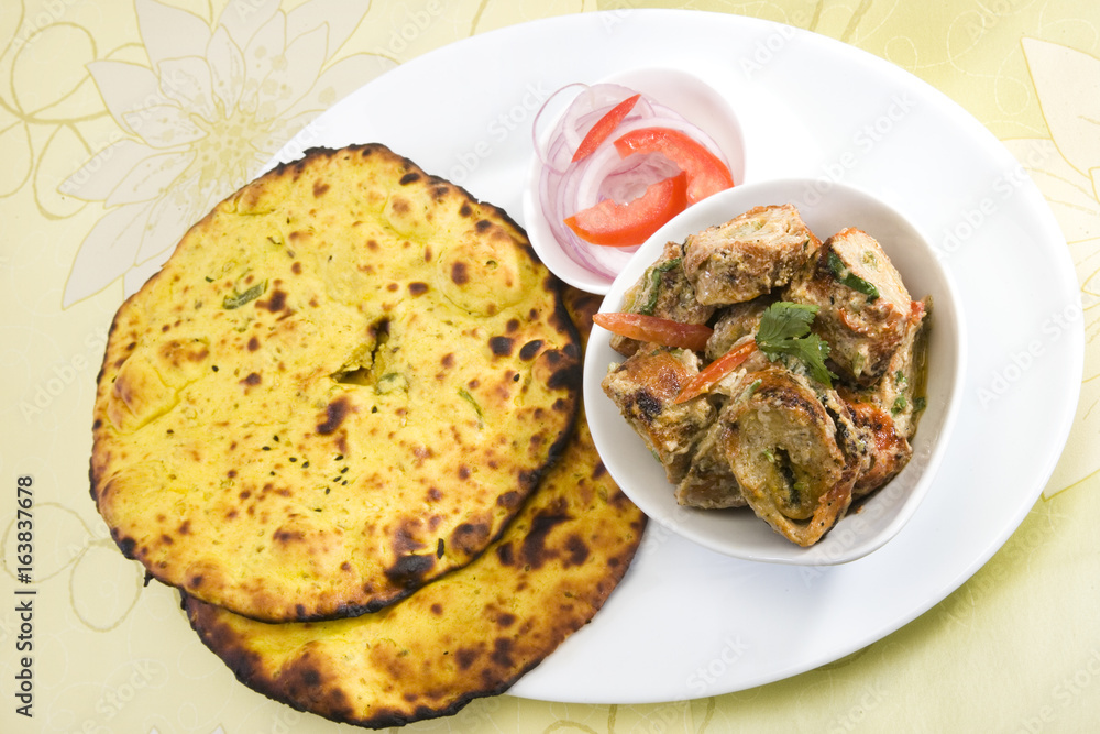 Soya Chaap Cooked in a Creamy Sauce with Missi Roti Stock Photo | Adobe ...