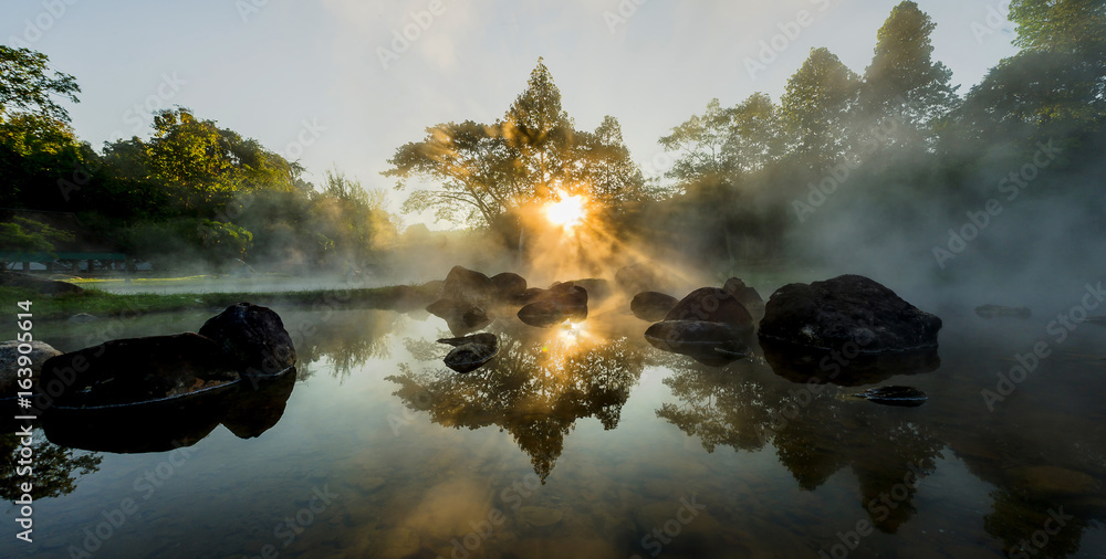 background blur light morning with the mist of the hot springs covered ...