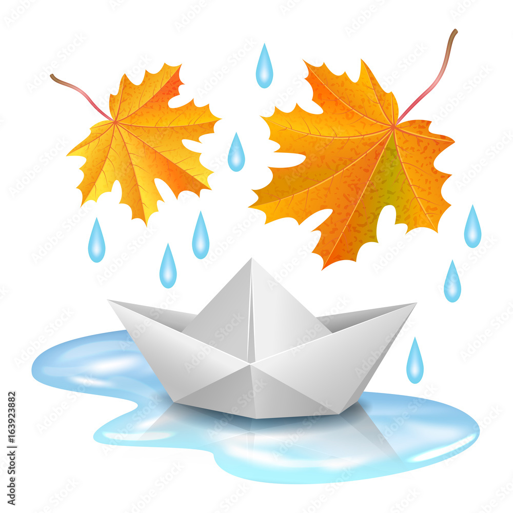 Paper boat in puddle, raindrops and falling orange maple leaves ...