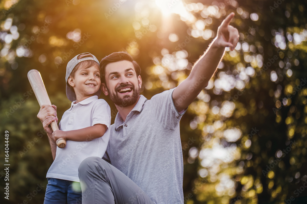 Dad with son playing baseball Stock Photo | Adobe Stock