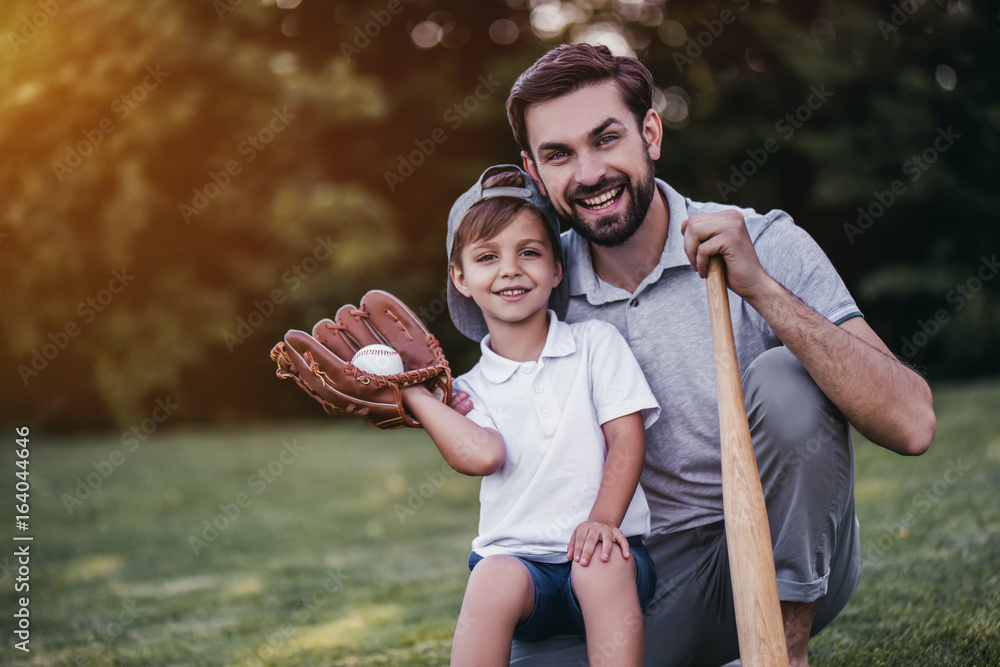 Dad with son playing baseball Stock Photo | Adobe Stock