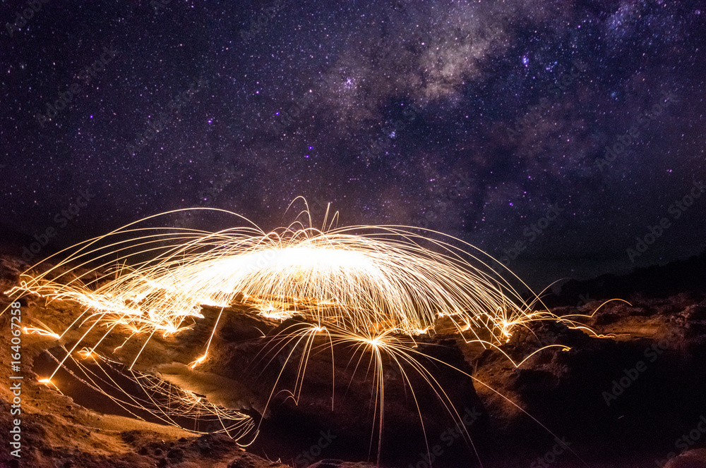 Amazing fireworks, Burning and spinning steel wool on the rock, Showers ...