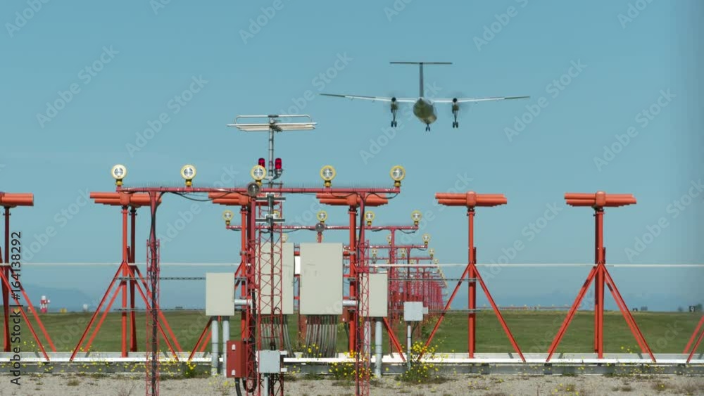 Commuter Prop Plane Landing in Sunshine 4K UHD. A prop airplane ...