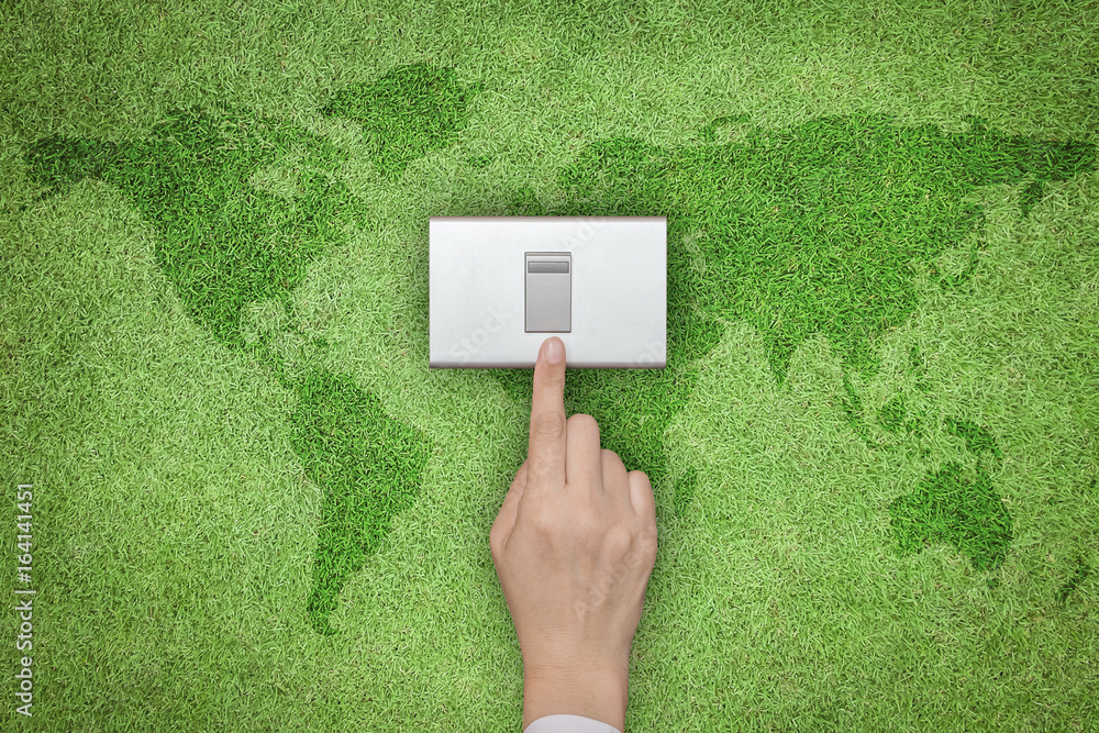 Energy saving and ecological friendly concept with hand turning off ...