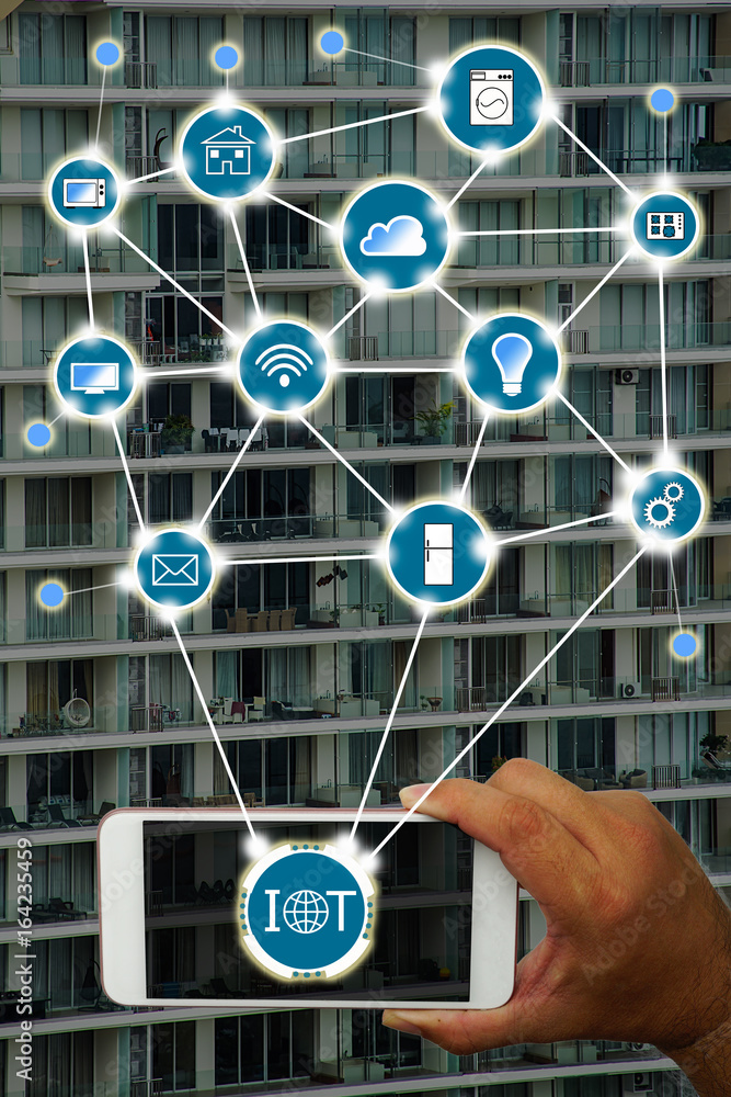 Internet of things (IOT) concept : Hand holding smartphone controlling ...