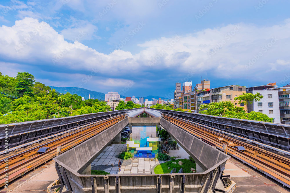 Railway tracks of an overground subway station Stock Photo | Adobe Stock