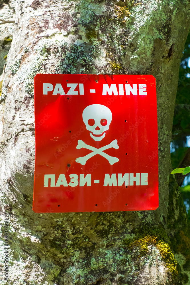 Mine or landmine symbol, warning sign Stock Photo | Adobe Stock