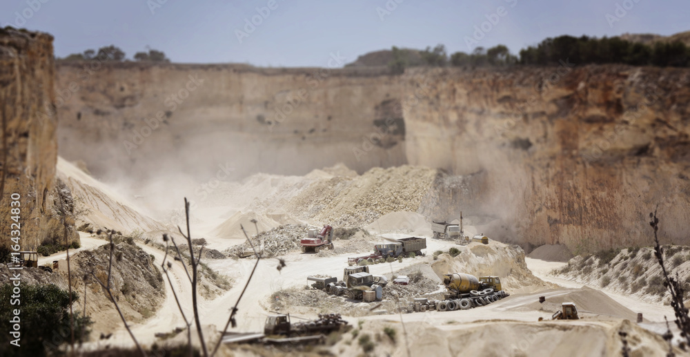 Panoramic view of the limestone quarry of Malta. A tilt-shift effect ...