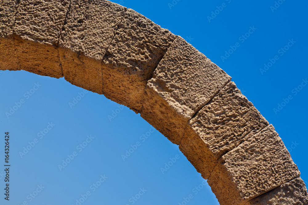 Roman old stone arc in caesarea Archaeological site close to Herod the ...