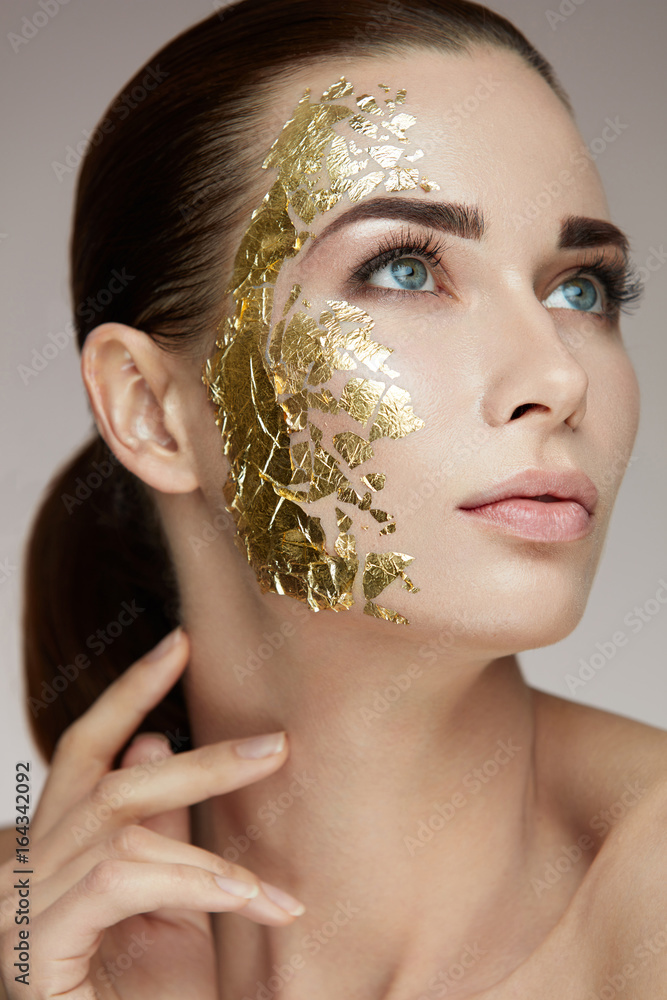 Beauty Gold Mask. Sexy Girl With Golden Mask Touching Body Stock Photo ...