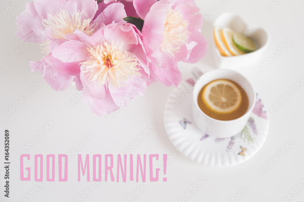 Bouquet of peonies, tea with lemon, photo in gentle colors. Good ...