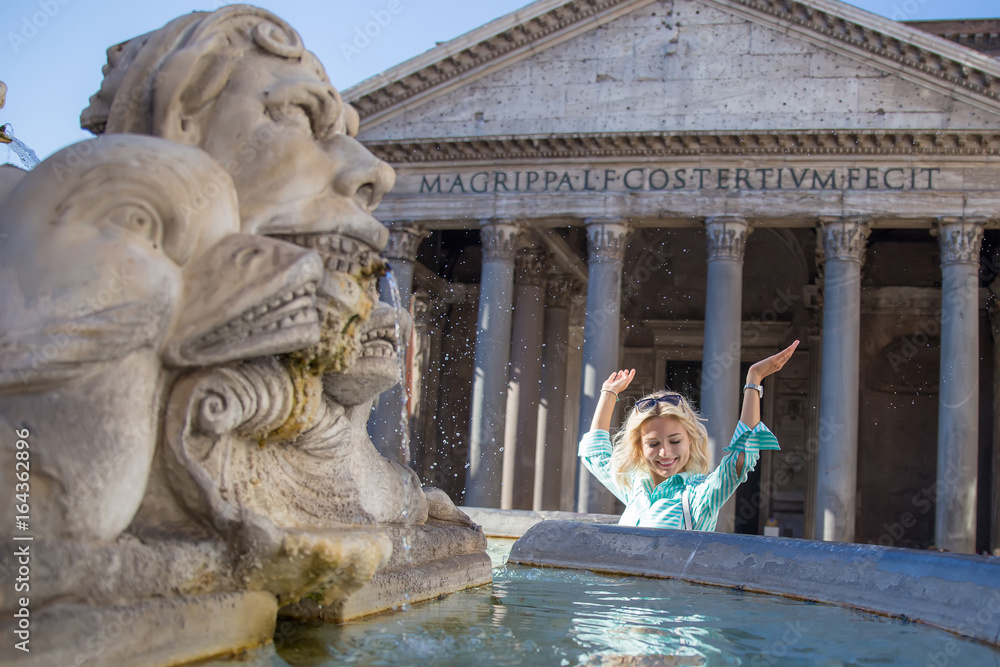 Poster Young attractive blond woman near Pantheon in Rome, play with ...