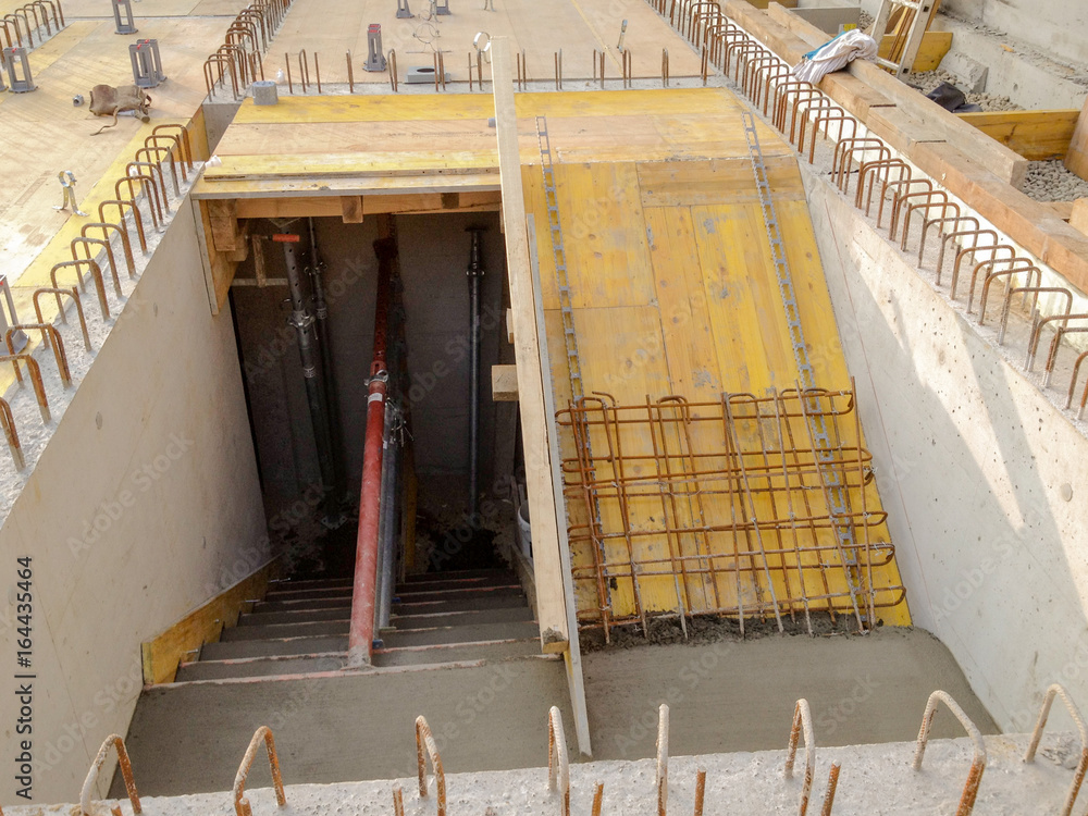 shawl panels and rebar iron for pouring a concrete stairwell on a ...