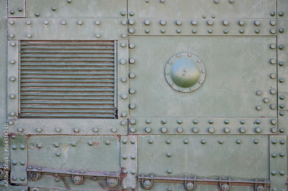The texture of the wall of the tank, made of metal and reinforced with ...