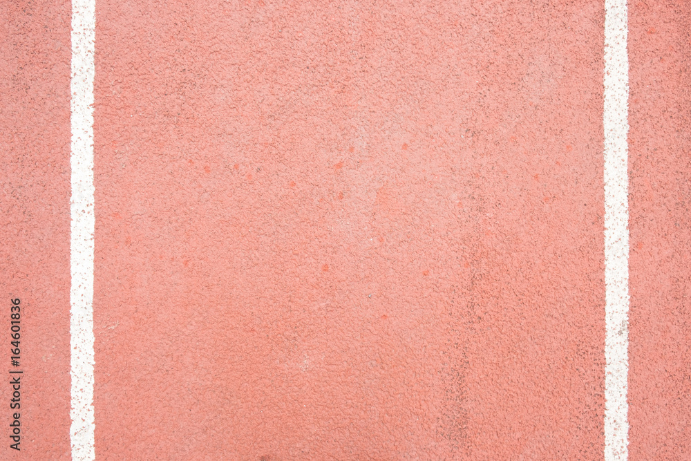 surface of the red running track in the stadium on top view for copy ...