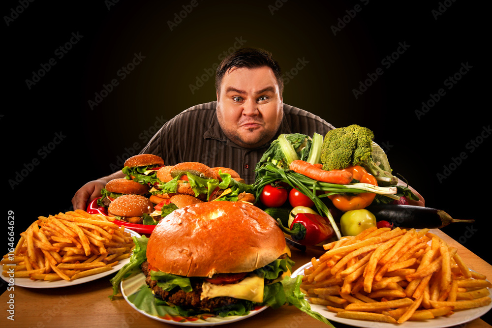 Diet fat man who makes choice between healthy and unhealthy food ...