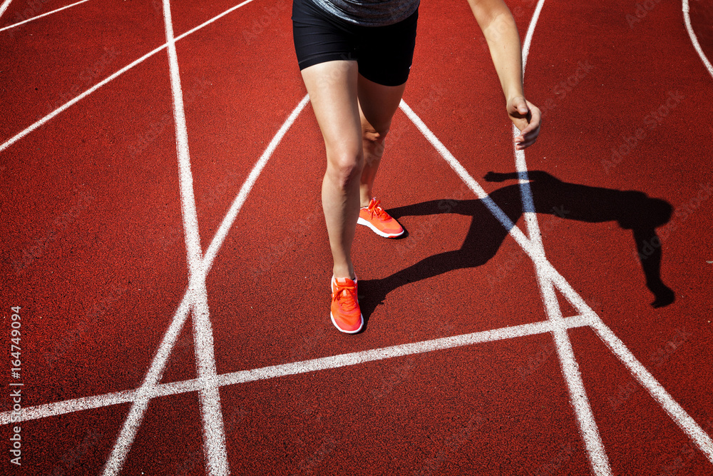 Sport backgrounds. Sprinter starting on the running track. Dramatic ...