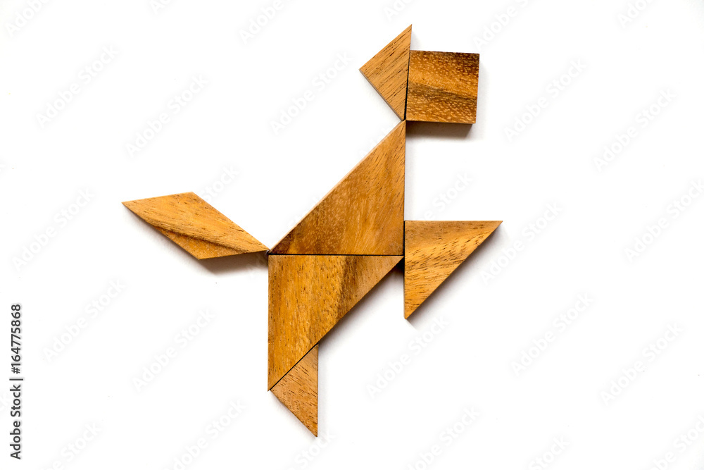Wooden tangram puzzle in happy dog shape on white background Stock ...