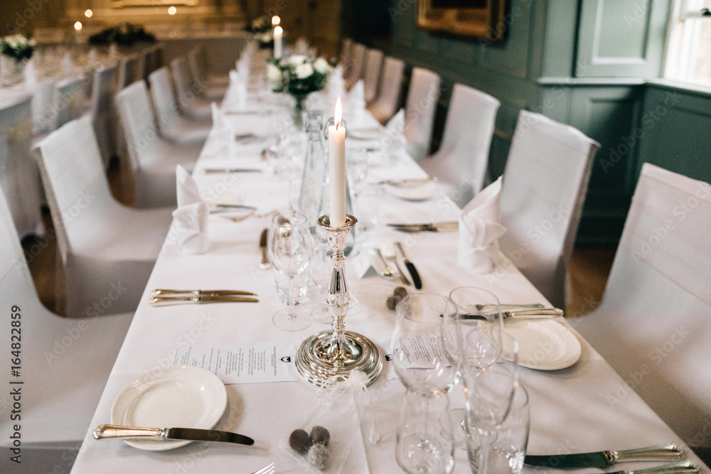 Fine dining table, silverware and candles Stock Photo | Adobe Stock