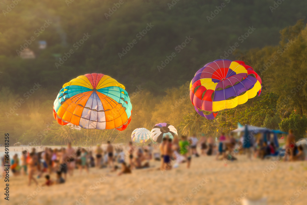 Colorful parasails showing on tropical beach..One of the most exciting ...