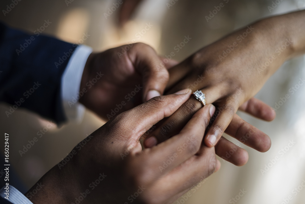 Groom Put on Wedding Ring Bride Hand Stock Photo | Adobe Stock