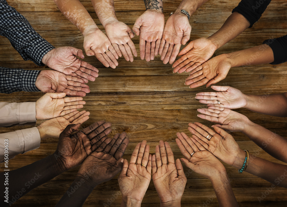 DIverse hands are together in a circle shape Stock Photo | Adobe Stock