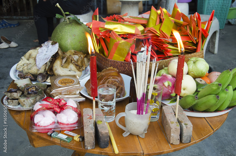 Thai people prepare sacrificial offering food on table for pray in ...