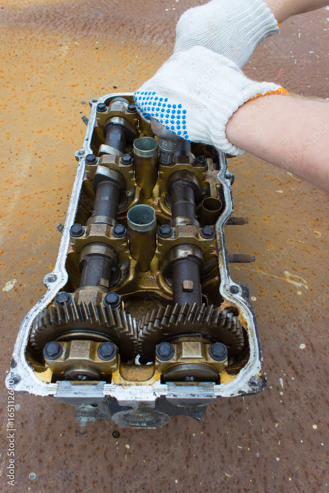 Cylinder head on rusty Stock Photo | Adobe Stock