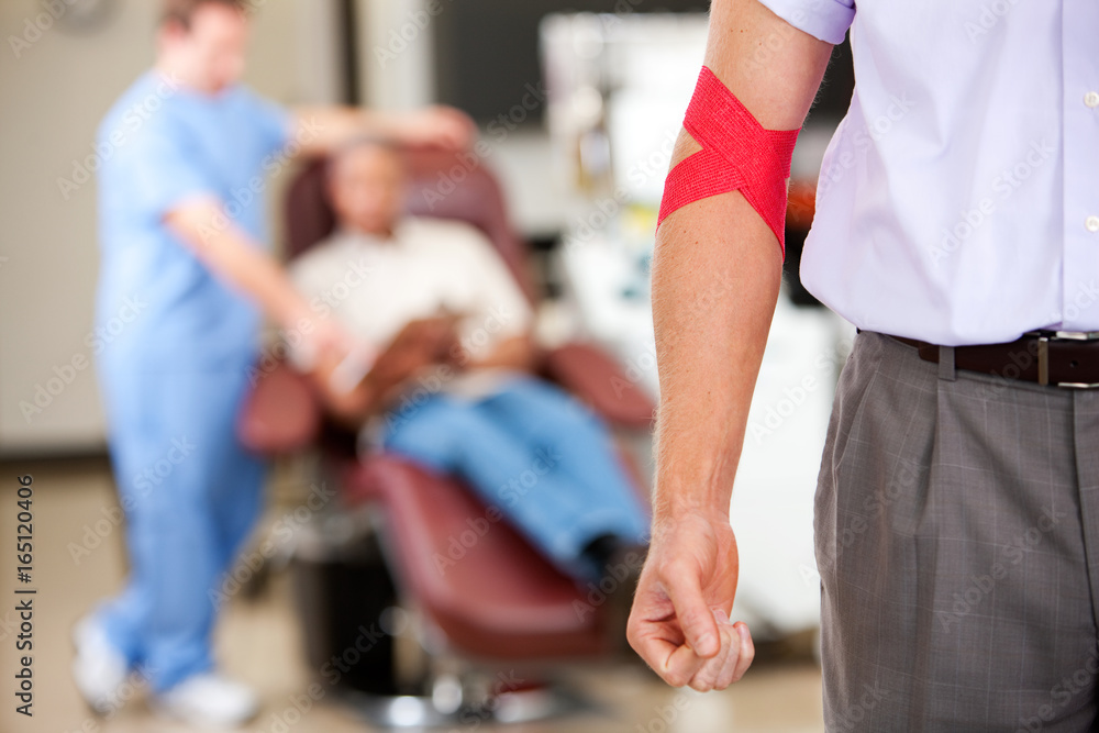 Blood Bank: Bandaged Arm of Blood Donor Stock Photo | Adobe Stock