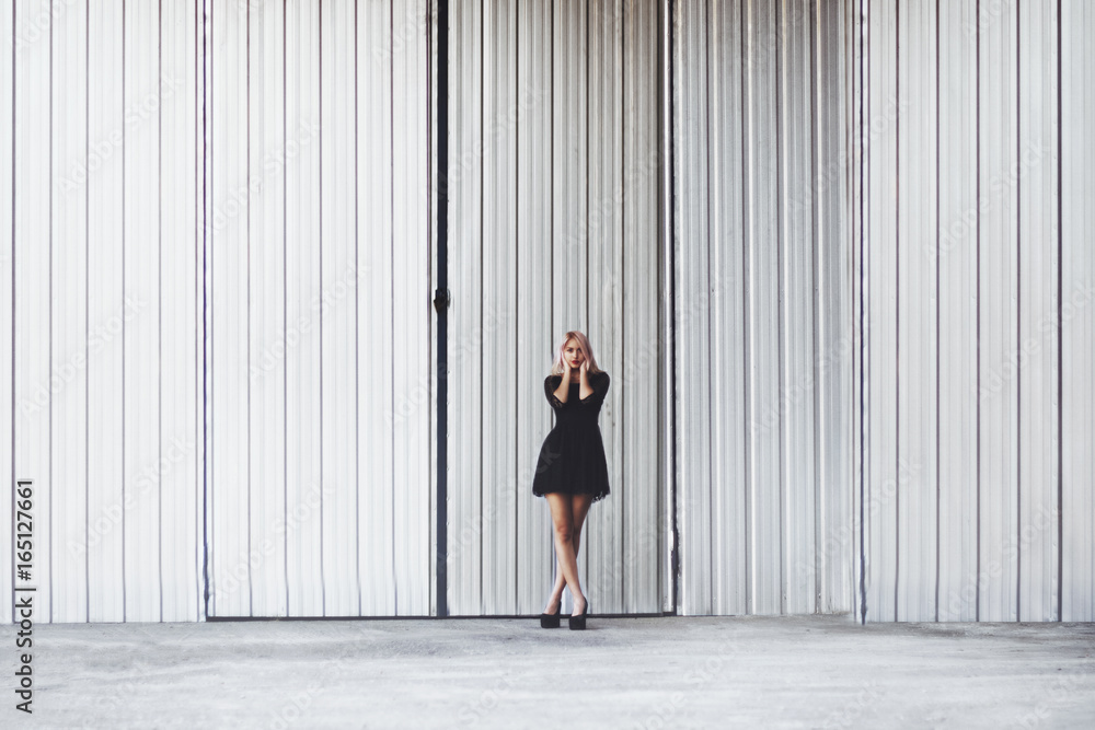 Model posing in urban surroundings. Stock Photo | Adobe Stock