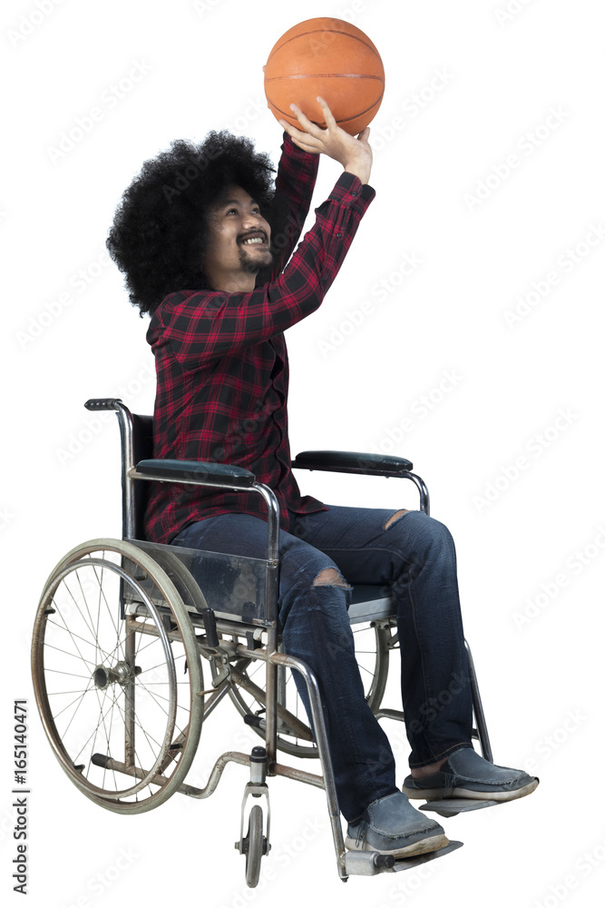 Disabled basketball player throwing a ball Stock Photo | Adobe Stock